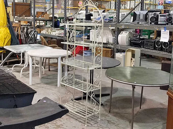 Outdoor furniture and bakers' racks stand at attention, ready for reassignment. That white metal shelf could organize your garden tools or display your prized succulent collection.