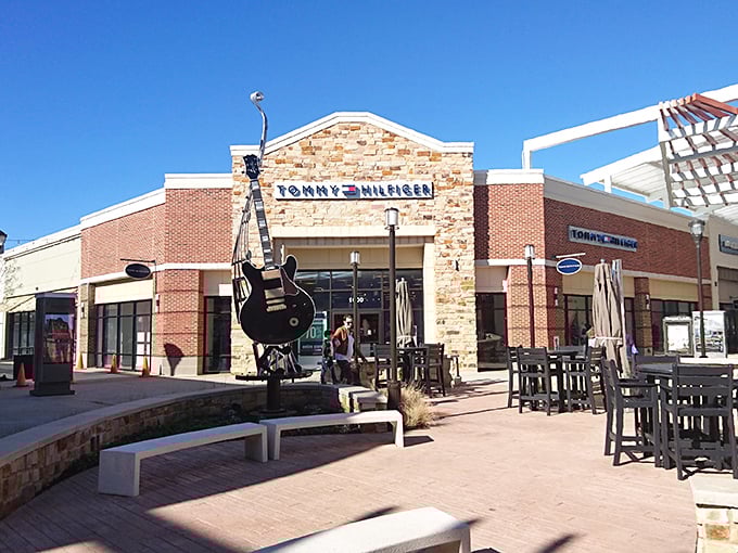 Tommy Hilfiger's storefront combines brick, stone, and preppy appeal—like a country club that welcomes everyone with open arms.