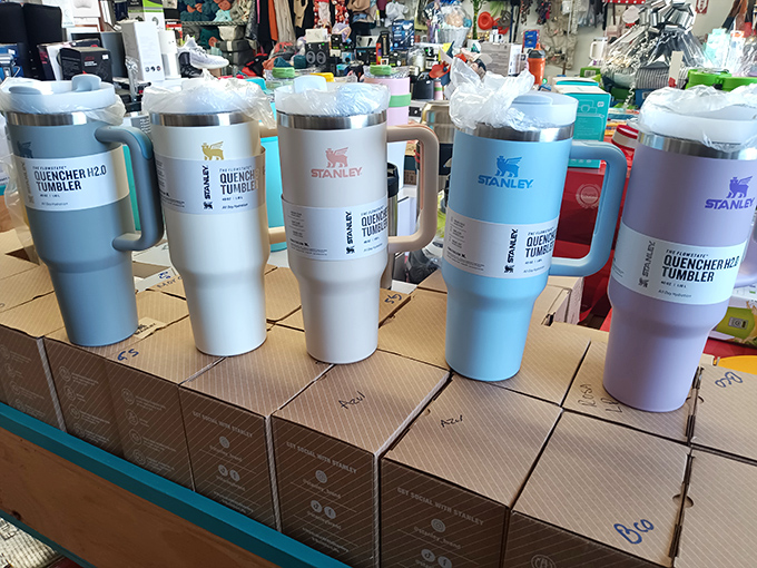 Stanley-style tumblers lined up like they're auditioning for a hydration commercial, minus the Hollywood markup.