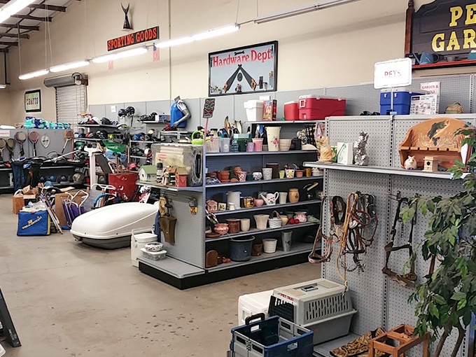 The "Hardware Dept" sign promises practical treasures for DIY enthusiasts. Those vintage garden tools have stories etched into their well-worn handles.