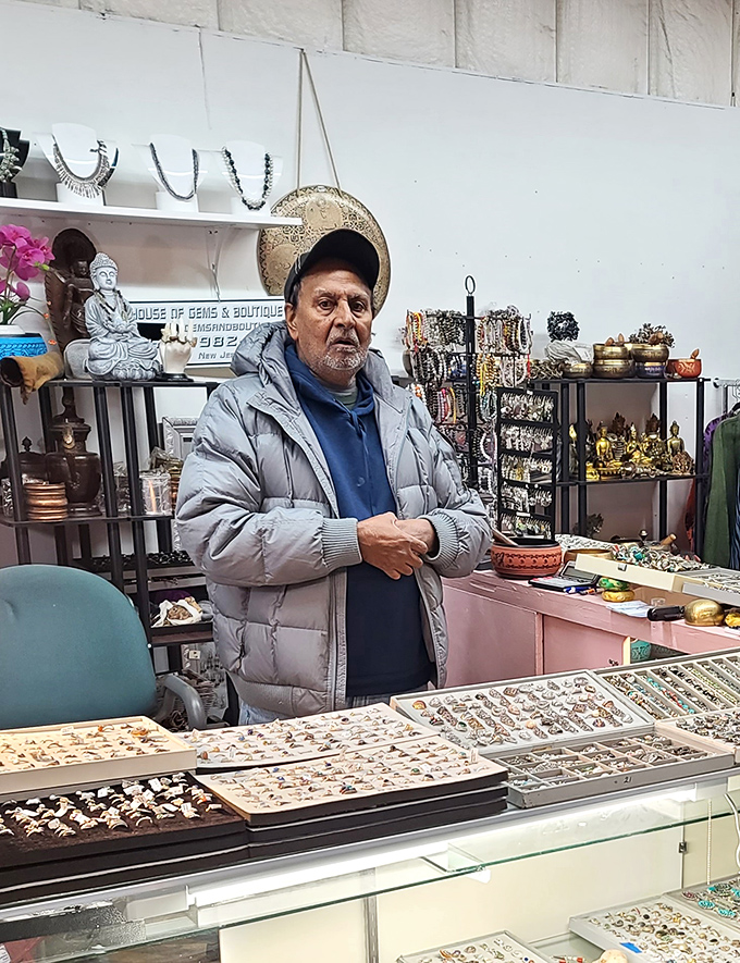 The jewelry vendor's domain, where stories are told through gemstones and metals. Each piece waits patiently for its next chapter in someone else's life story.