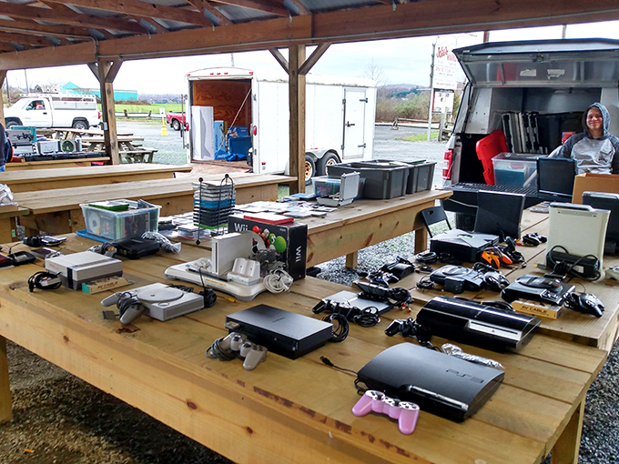 Gaming history laid bare on wooden tables. From Atari to PlayStation, every generation's childhood sits waiting for a second life.