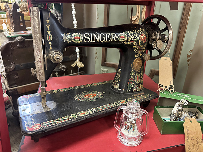 This vintage Singer sewing machine features decorative detailing that modern appliances can only dream about – functional art at its finest.
