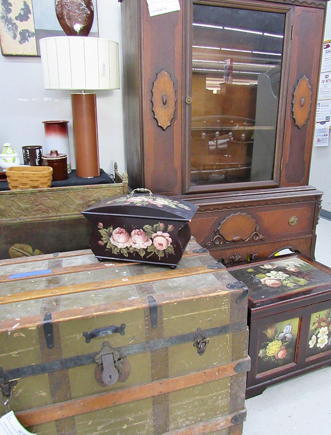 Antique furniture with character to spare. That hand-painted box and vintage trunk have seen more history than most history books.