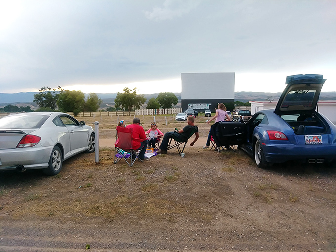 The ultimate outdoor living room setup. These folks have clearly mastered the art of drive-in comfort.