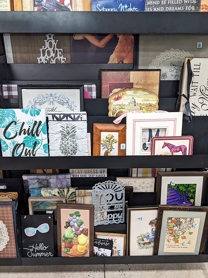 Wall art that spans every taste from "Live, Laugh, Love" to "Is that a pineapple or an artistic statement?" All priced to move!