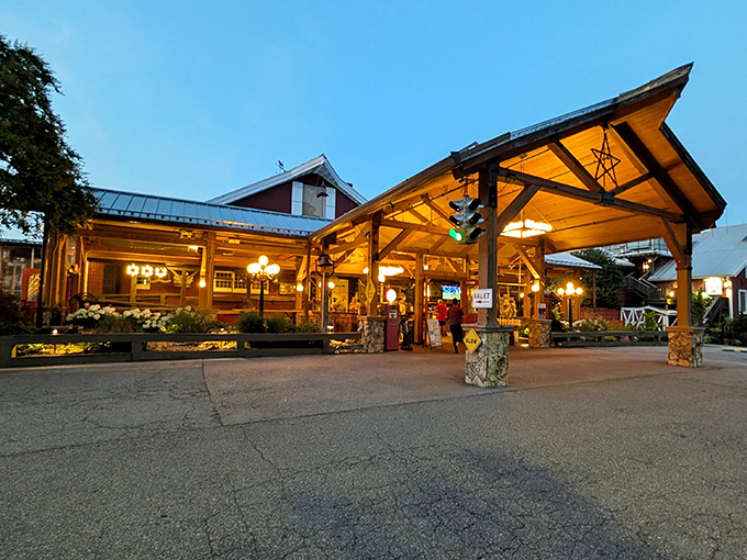 Angus Barn's welcoming covered entrance feels like arriving at a rustic steak paradise.