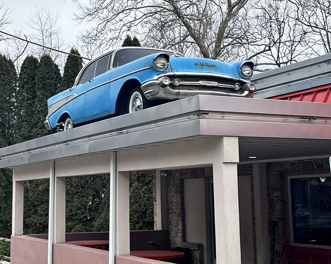 That classic blue car on the roof isn't just decoration&mdash;it's a time machine announcing your journey to flavor's past.