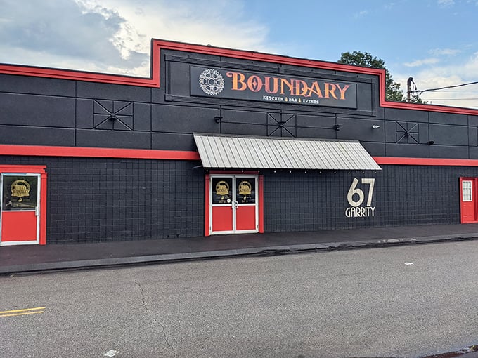 Boundary Kitchen's bold black exterior with red accents is like a film noir set where the plot twist is amazing BBQ.