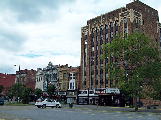 Bradford's vintage theater marquee lights up the night, promising entertainment without streaming service password anxiety.