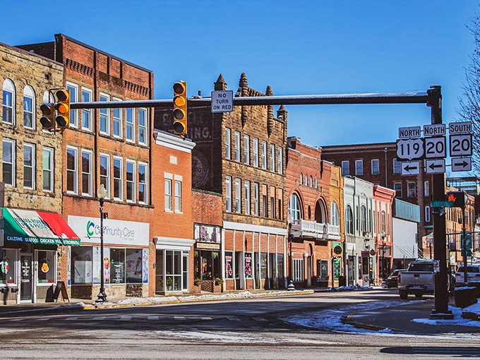 This charming street, lined with quaint signs, proves that good things come in beautifully preserved small packages.