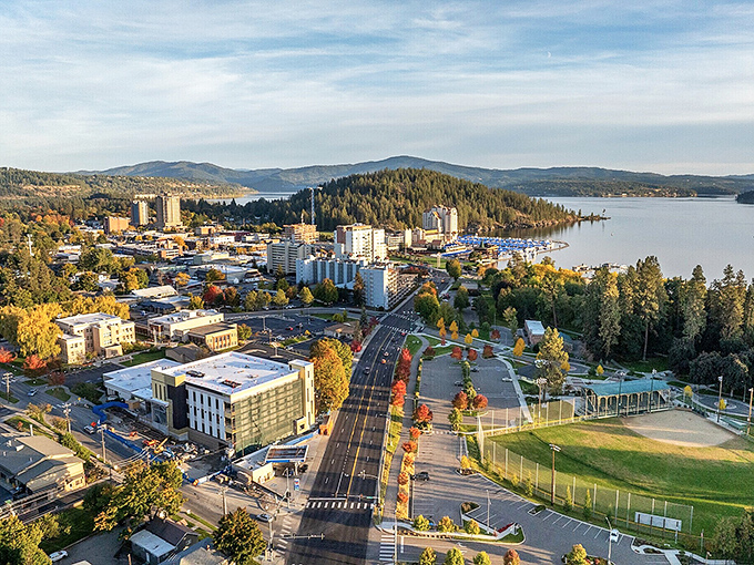Coeur d'Alene from above reveals its perfect positioning between forested hills and the jewel-toned waters of the lake.