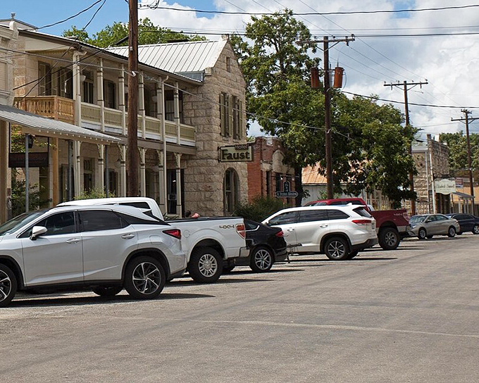 Comfort's limestone buildings have weathered generations of Texas summers, standing proud along streets where neighbors still greet each other by name.