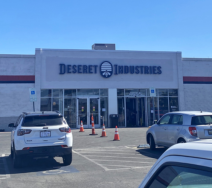 Beehive of bargains! Deseret Industries' clean lines and traffic-cone welcome suggest an organized treasure trove waiting behind those glass doors.