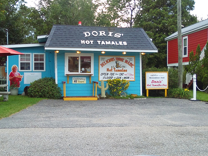 Doris' Hot Tamales looks like a dollhouse for tamale lovers. This cheerful blue cottage has been satisfying cravings longer than most marriages last.