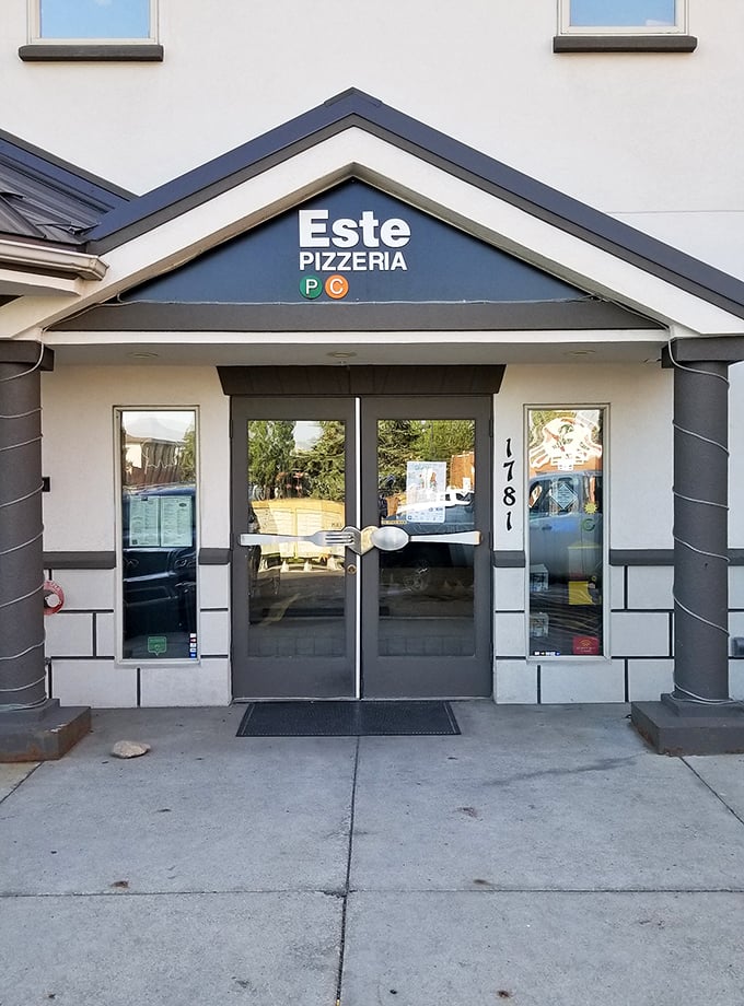 Este Pizzeria's clean lines and simple signage hide pizza greatness in plain sight. Sometimes the best NY-style slices come in understated packages.