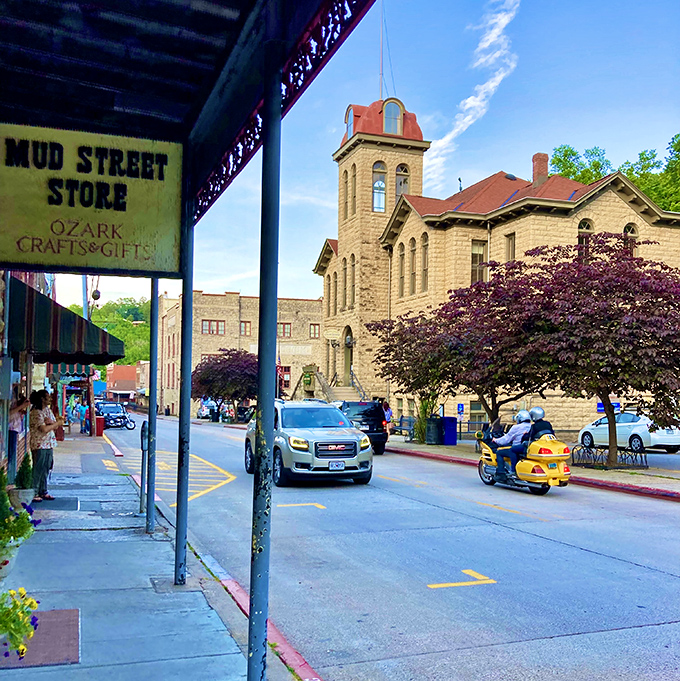 Mud Street Store invites passersby to discover Ozark treasures, while the historic courthouse stands guard over Eureka Springs' Victorian charm.
