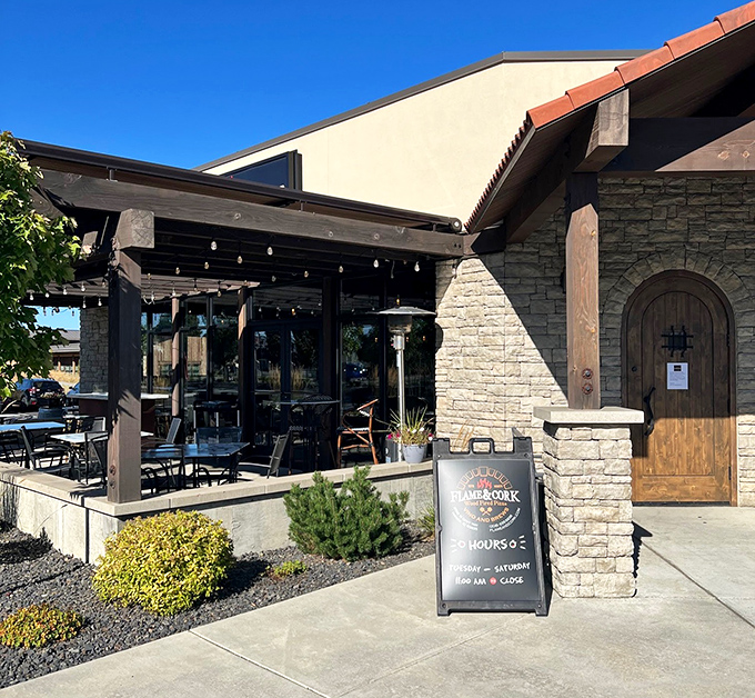 Flame and Cork's stone fa&ccedil;ade and cozy patio set the perfect stage for wood-fired pizza magic to unfold.