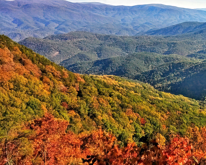 Fort Mountain's sweeping vistas reward hikers with breathtaking panoramas. The rolling Blue Ridge Mountains stretch to the horizon like waves.