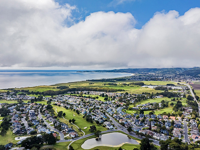 Half Moon Bay's coastal community spreads out like a model village come to life. The kind of aerial view that makes you appreciate California living.