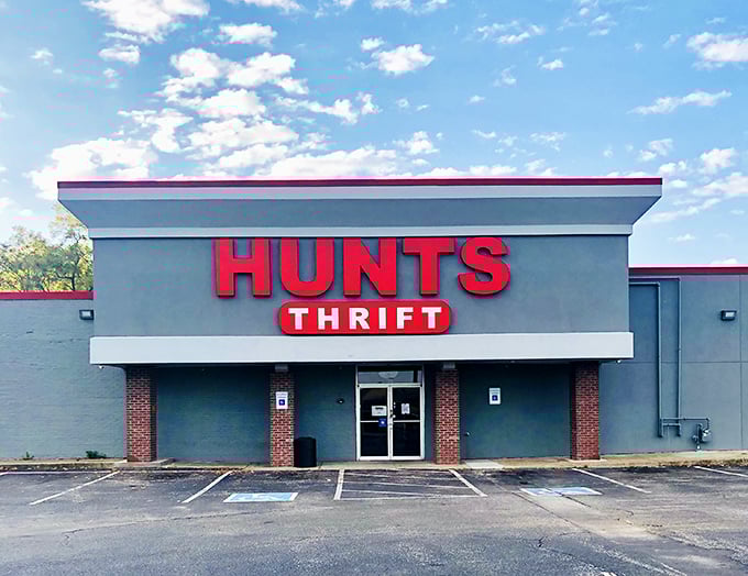 Hunt's bold red signage stands out like a beacon of bargains in a sea of retail sameness.