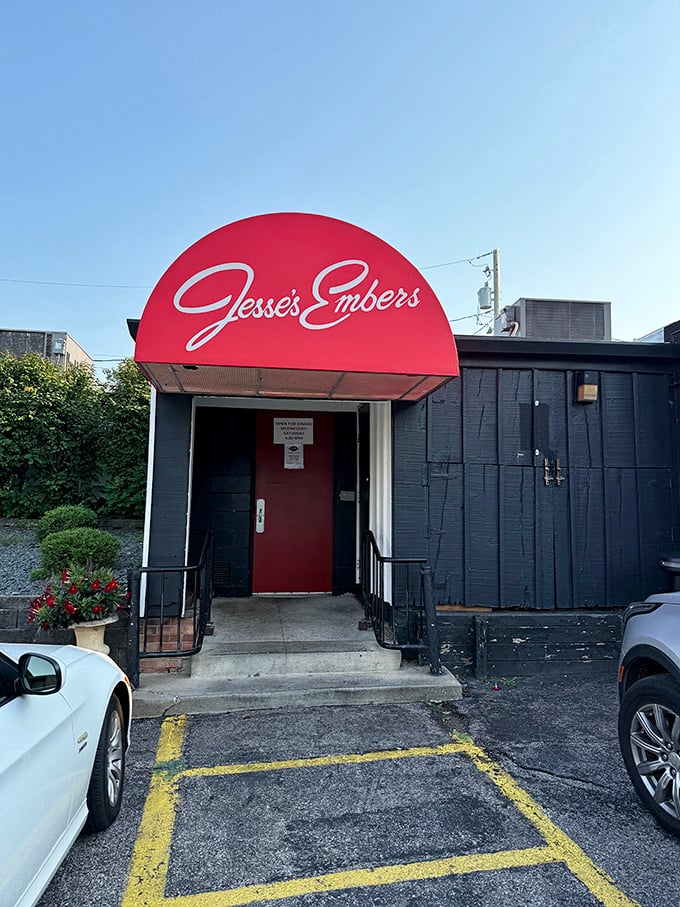 That iconic red awning glowing at dusk looks like a beacon calling all serious steak lovers home to Des Moines.