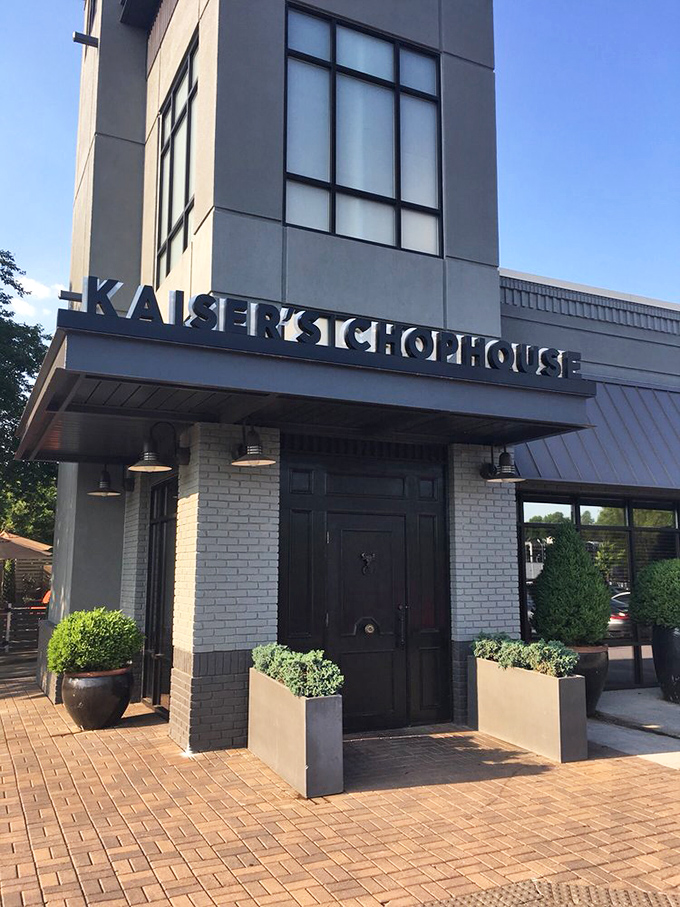 Sleek brick and modern design signal upscale steakhouse dining that still welcomes families and casual diners.