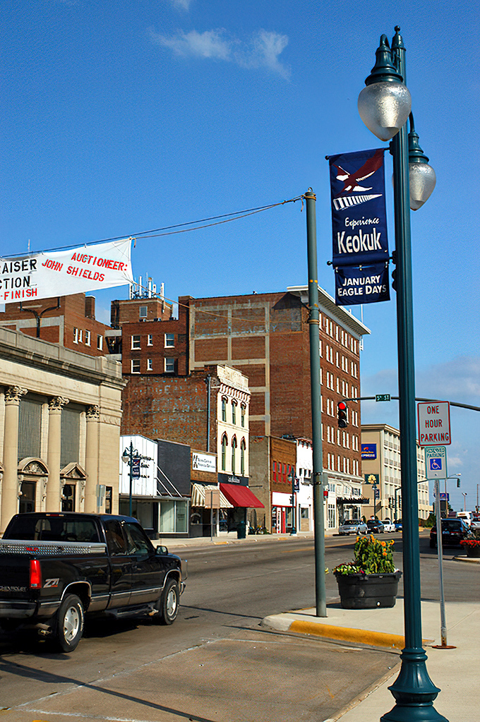 Keokuk proudly displays its "Experience Keokuk" banner like an invitation to slow down. Those historic buildings have seen the Mississippi flow by for generations.