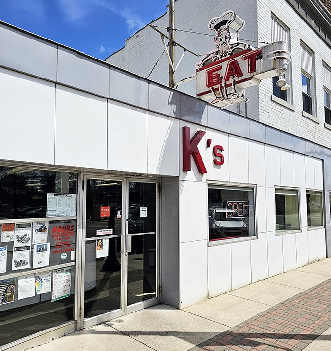 K's Hamburger Shop exterior - That vintage "EAT" sign has been directing hungry folks to burger bliss since before fancy food was invented. Simple perfection.