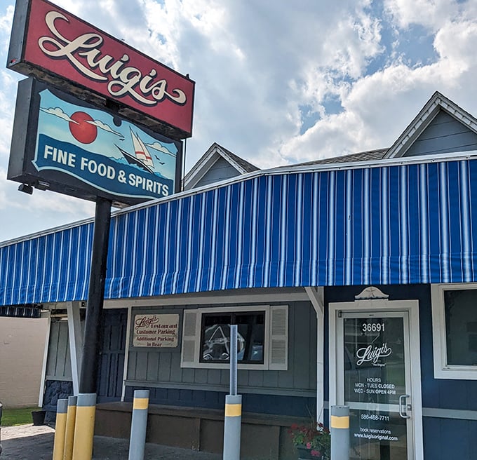 Luigi's sign captures that perfect Michigan summer day &ndash; blue skies, sailboats, and pizza waiting at the dock.