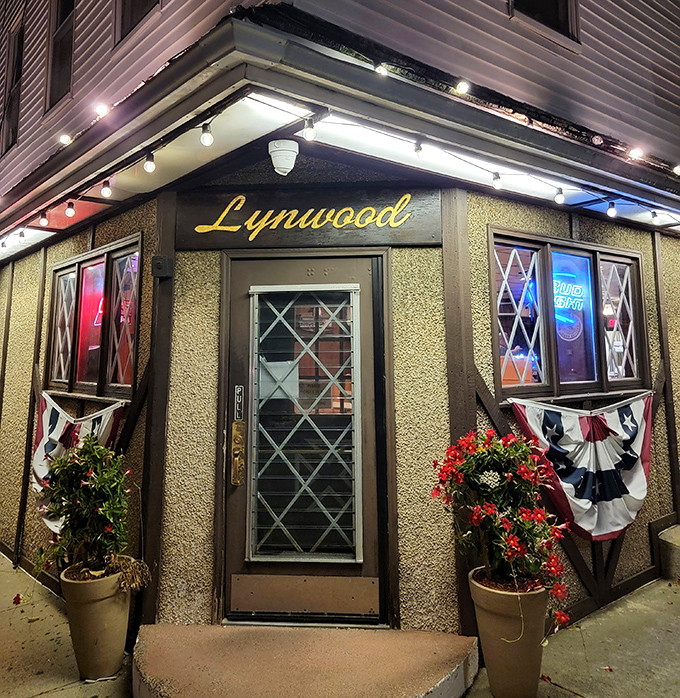 The Lynwood's storybook exterior glows with promise after dark. Inside those diamond panes: bar pizza nirvana.