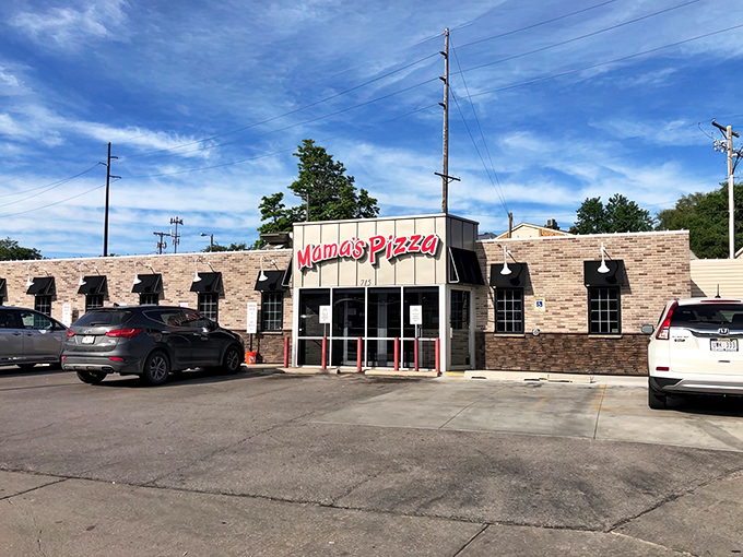Mama's Pizza's brick building stands like a sentinel of satisfaction, guarding recipes that have stood the test of time.