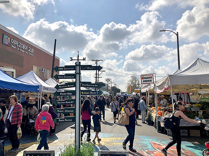 A unique signpost marks the bustling Mar Vista market, where local food and goods turn shopping into an adventure experience.