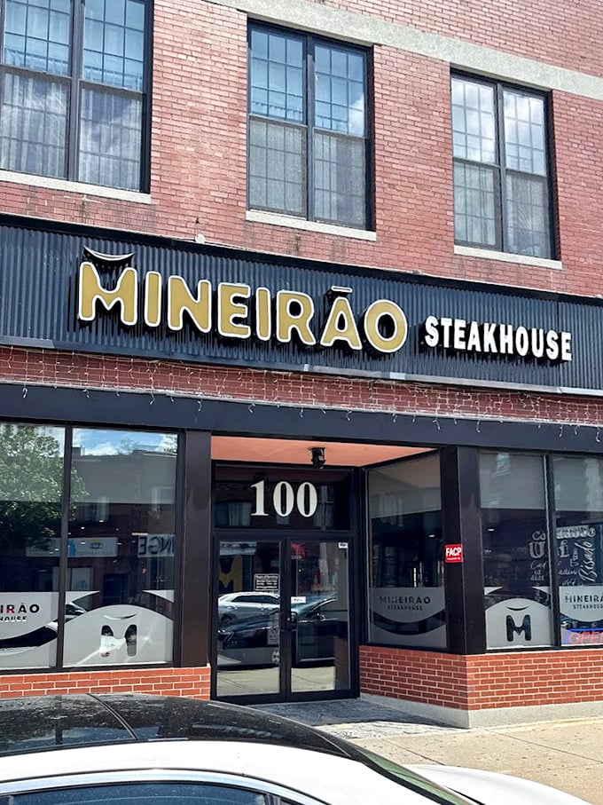 Mineir&atilde;o's bold brick storefront promises Brazilian steak adventures. A meat parade awaits behind these doors!