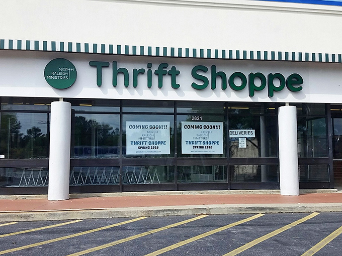 North Raleigh Ministries Thrift Shoppe announces itself with classic green signage—like a beacon for bargain hunters with champagne taste on a root beer budget.