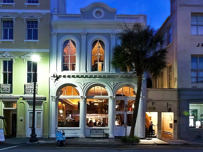 Oak Steakhouse glows like a Victorian postcard at night, inviting you into Charleston's delicious history.