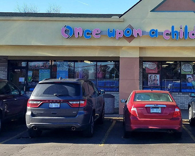 Once Upon A Child's playful signage promises a wonderland for parents. Kid-focused thrifting at its most organized!