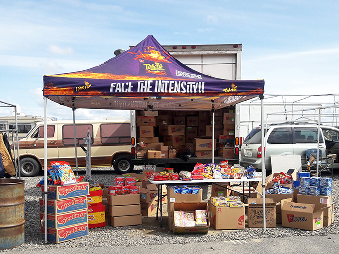 Eastern Washington sunshine illuminates a snack vendor's colorful display of treats and goodies.