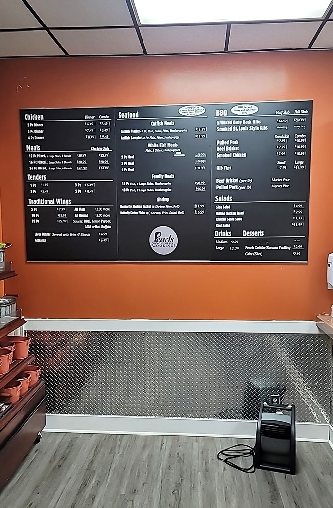 No frills, all flavor! Pearl's menu board showcases Southern classics that keep locals coming back daily.