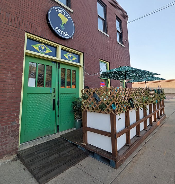 Those bright green doors at Roots of Brasil are portals to seafood with South American soul &ndash; moqueca magic awaits inside.