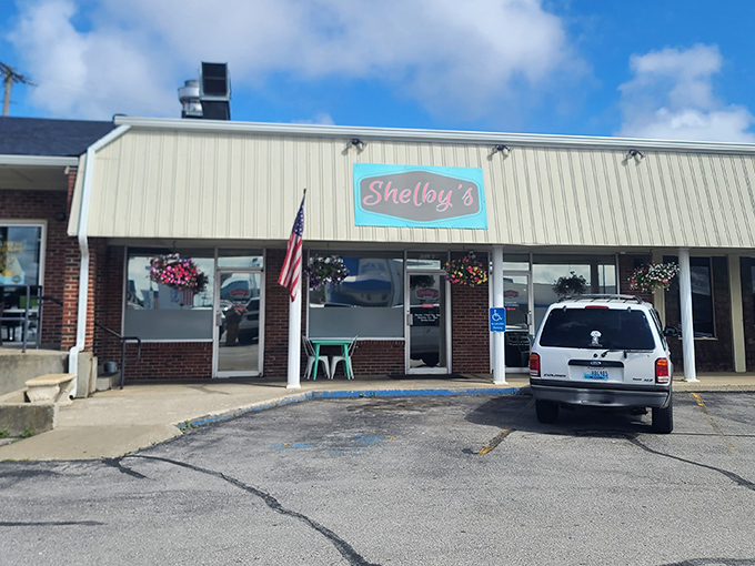 Shelby's simple storefront hides breakfast greatness like a superhero's secret identity. That American flag signals patriotic devotion to perfect eggs.