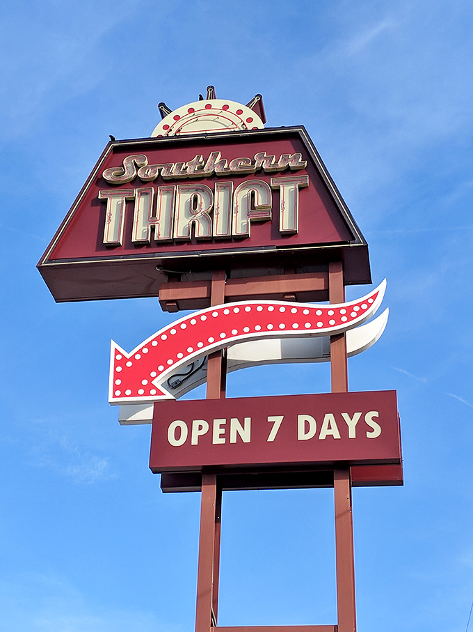 Southern Thrift's vintage-inspired sign glows against the Tennessee sky, a beacon for bargain hunters.