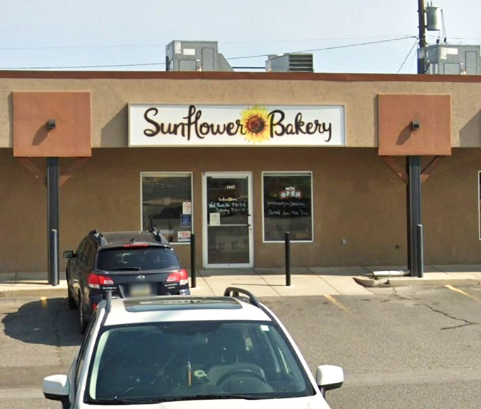 Sunflower Bakery's cheerful sign promises sunshine in pastry form, and boy, does it deliver.