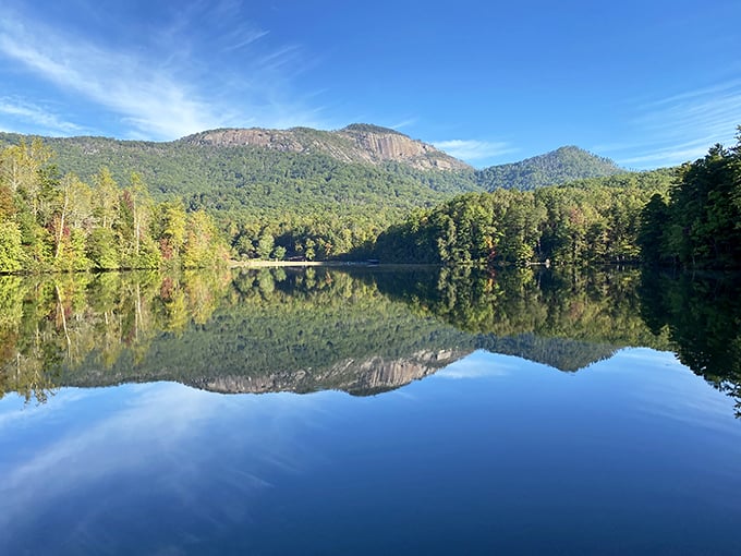 Table Rock's mirror-like lake perfectly captures the mountain's majesty, doubling the beauty in one breathtaking view.