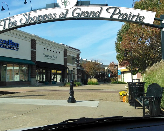 The charming archway of The Shoppes at Grand Prairie invites visitors into a more civilized shopping experience, where rushing feels almost rude.