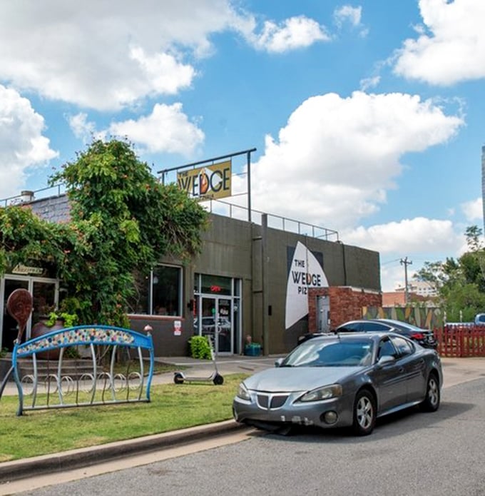 The Wedge Pizzeria's industrial-chic building houses pizza artistry. That rooftop patio is calling your name on Oklahoma's perfect evenings.