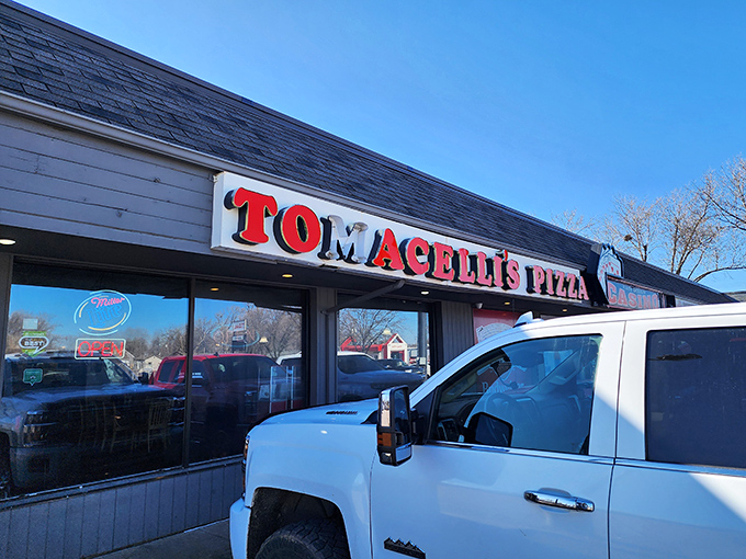 No-nonsense exterior hiding decades of pizza-making wisdom. The best joints often come with the simplest packaging.