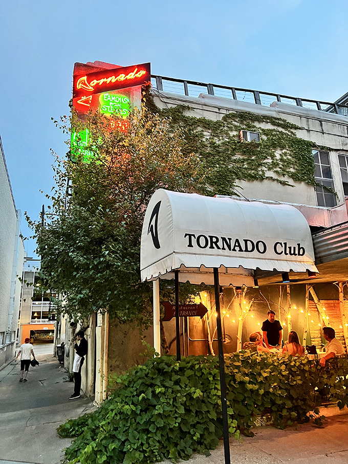 Tornado's neon sign cuts through Madison's night like a beacon for the hungry. That vintage glow has guided steak lovers for generations.