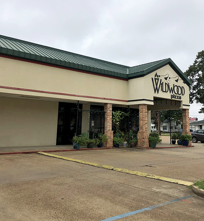 Wildwood's simple exterior gives no hint of the wood-fired wonders waiting just beyond those doors.