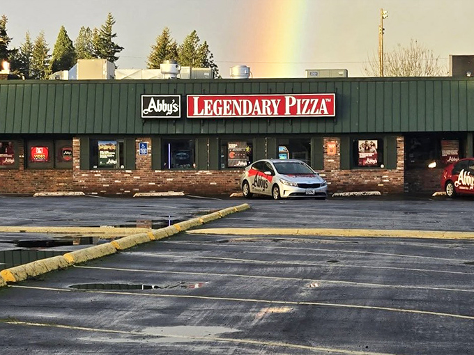 That rainbow appearing over Abby's isn't coincidence&mdash;it's nature's way of pointing to where pizza treasure awaits.